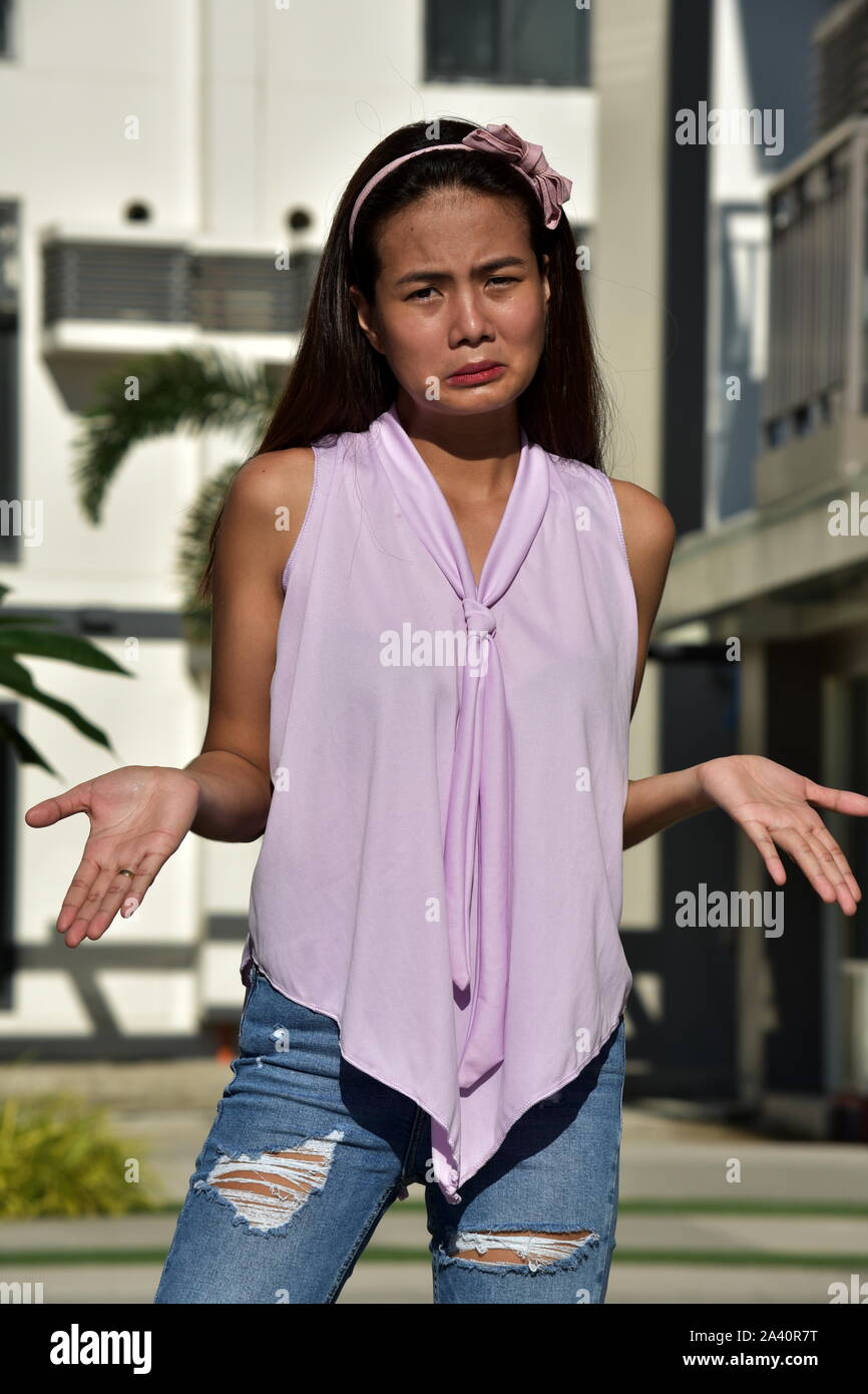 An Indecisive Asian Person Stock Photo - Alamy
