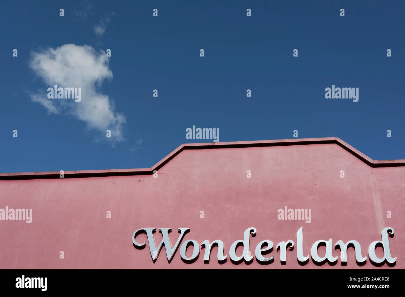 A single fluffy cloud in blue sky passes over Wonderland, a former ...