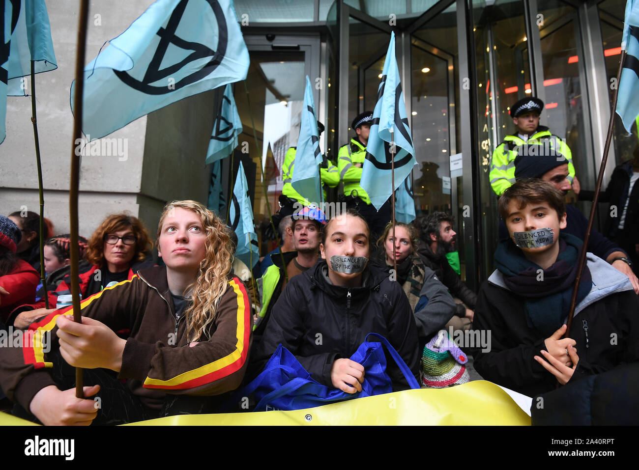 Protesters blocking the entrance to the BBC New Broadcasting House in ...