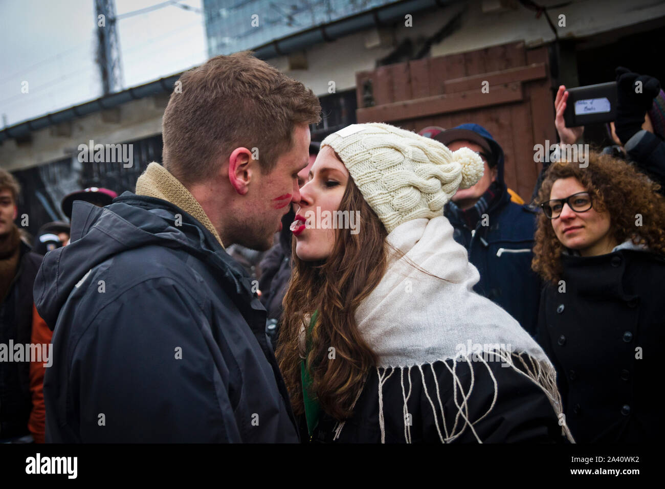 A couple kissing with ice cubes at the Hipster Winter Olympiale in ...