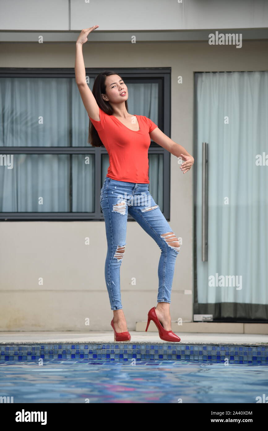 Dancing Youthful Female Standing Stock Photo - Alamy