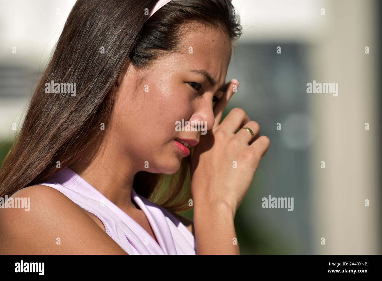 Tearful Asian Person Stock Photo - Alamy