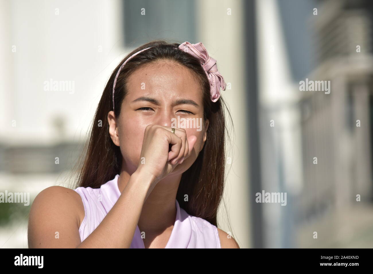 Filipina Woman And Illness Stock Photo - Alamy