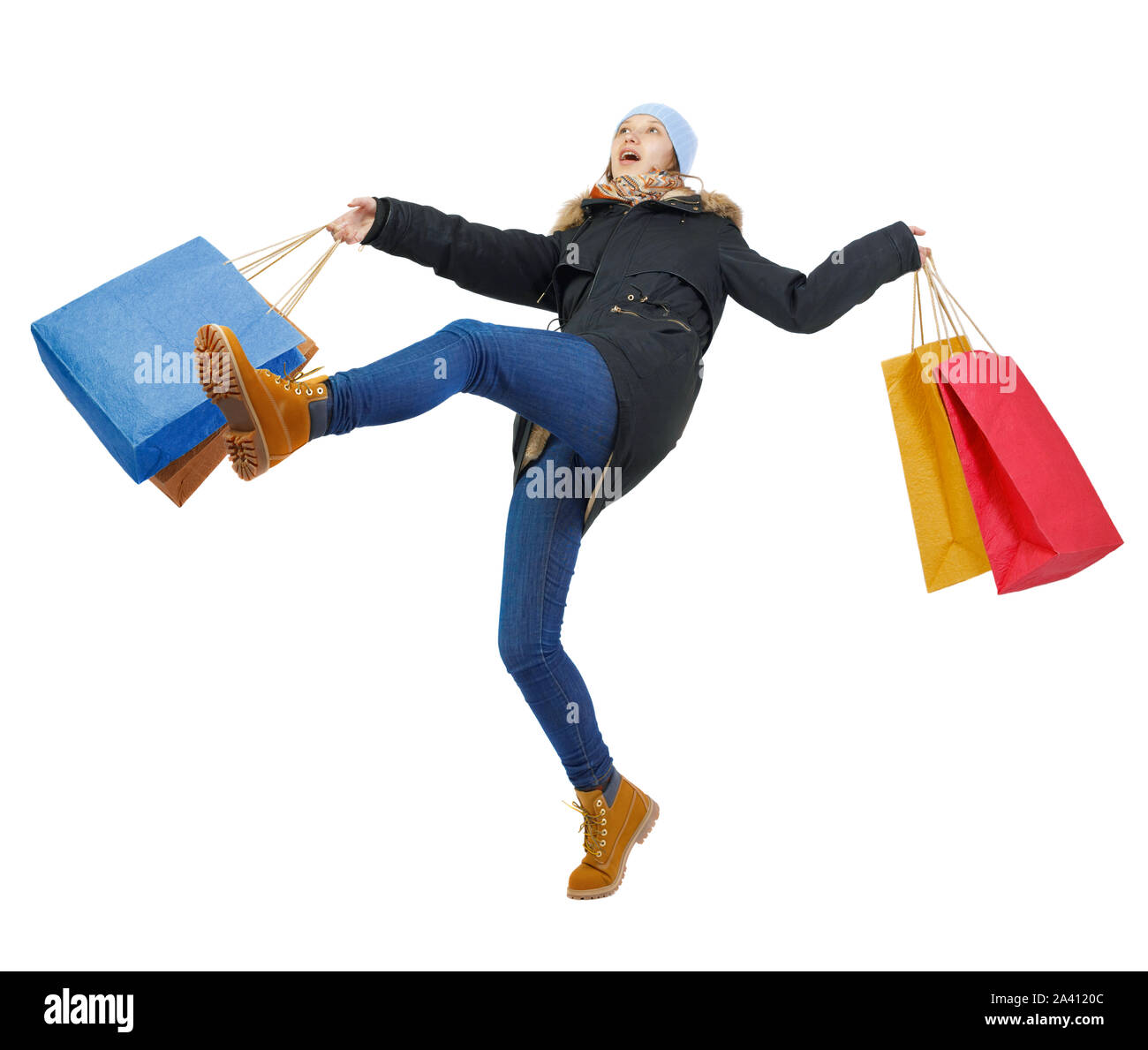 Falling woman with shopping bags. beautiful girl in motion. backside ...