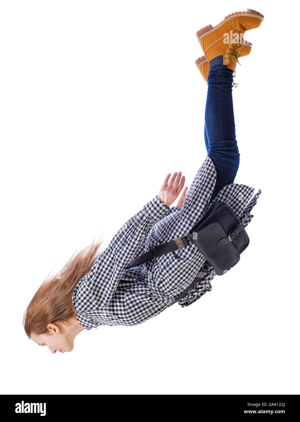 Side view of woman in zero gravity or a fall. girl is flying, falling ...