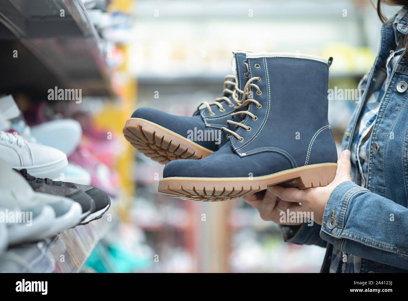 Woman boots counter hi-res stock photography and images - Alamy