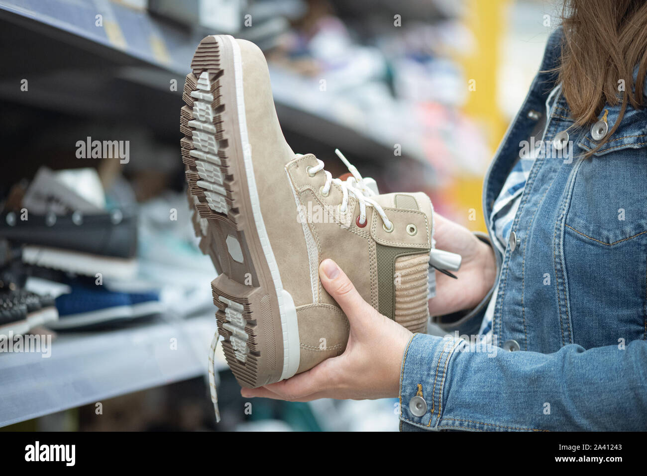 Woman boots counter hi-res stock photography and images - Alamy