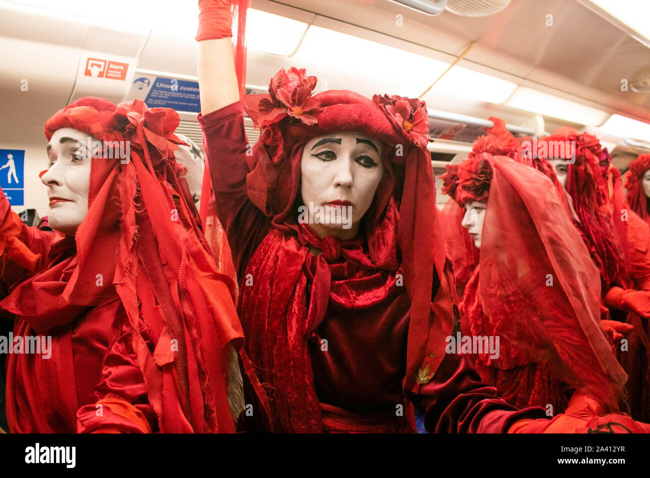 London, UK - 11 October 2019. Red Rebels from Extinction Rebellion ...
