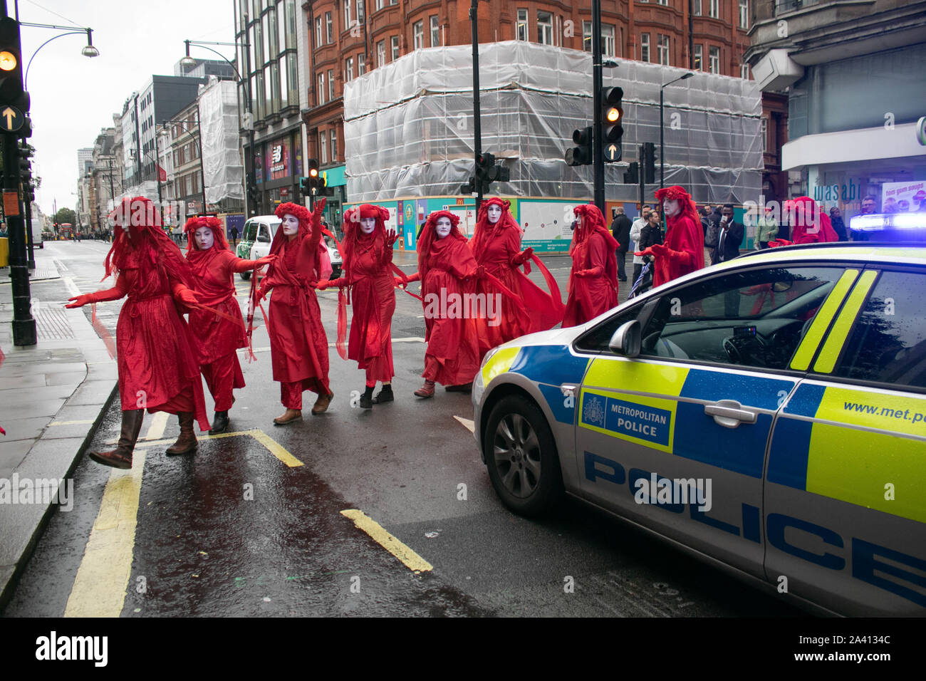 London, UK - 11 October 2019. Red Rebels from Extinction Rebellion ...