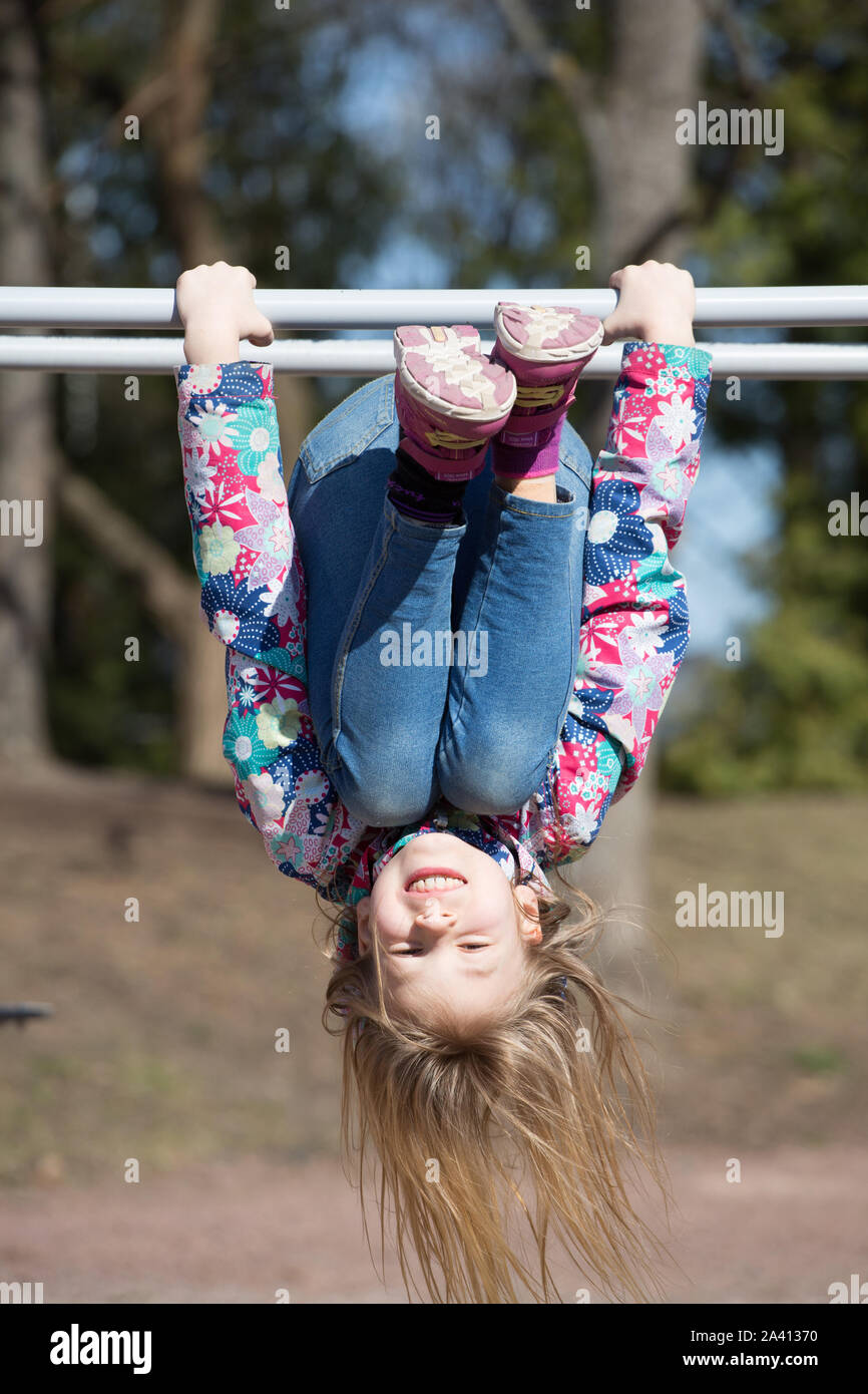 Child playing at playground Stock Photo - Alamy