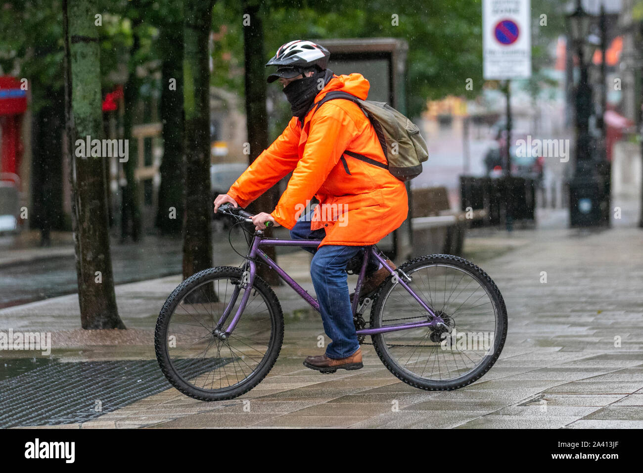 Cycling in the rain in Preston, Lancashire. UK Weather. 11th October ...