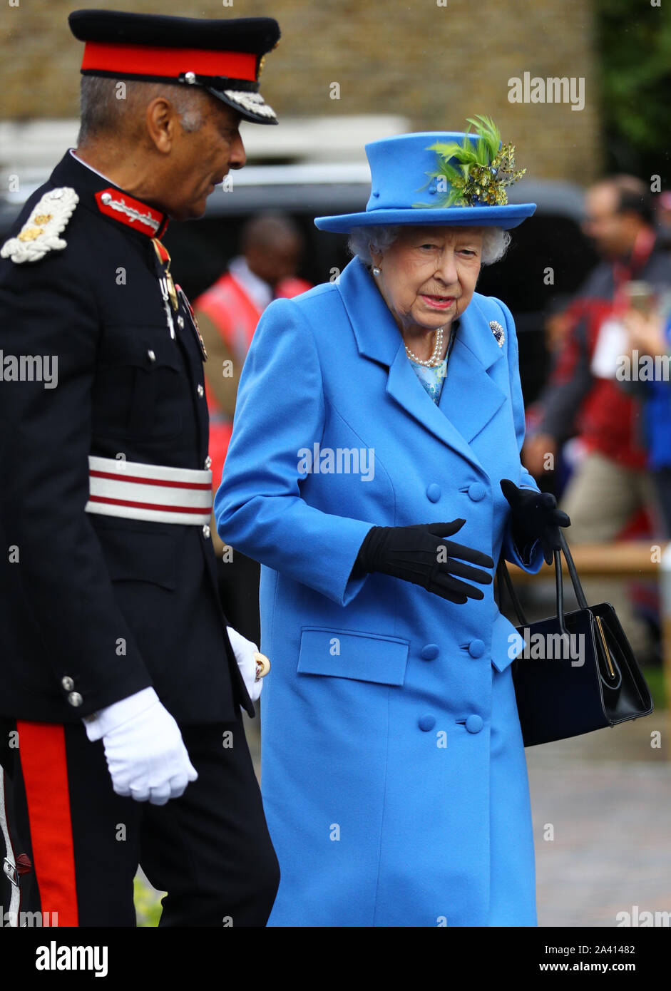 Queen Elizabeth II arrives to visit Haig Housing Trust, Morden, London ...