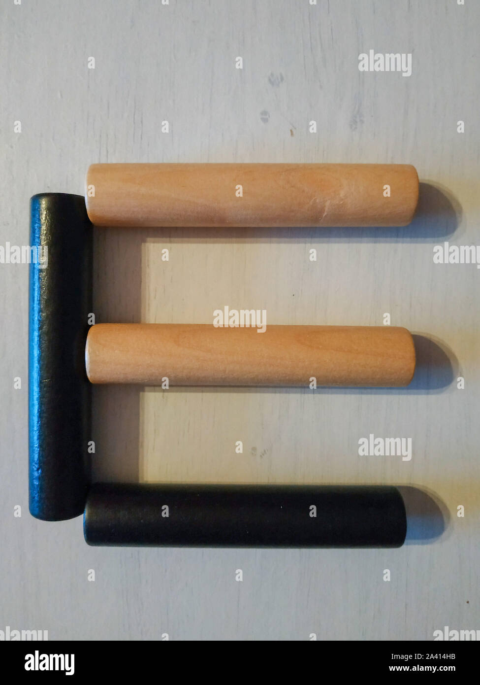 E wood stick letter design concept Stock Photo - Alamy