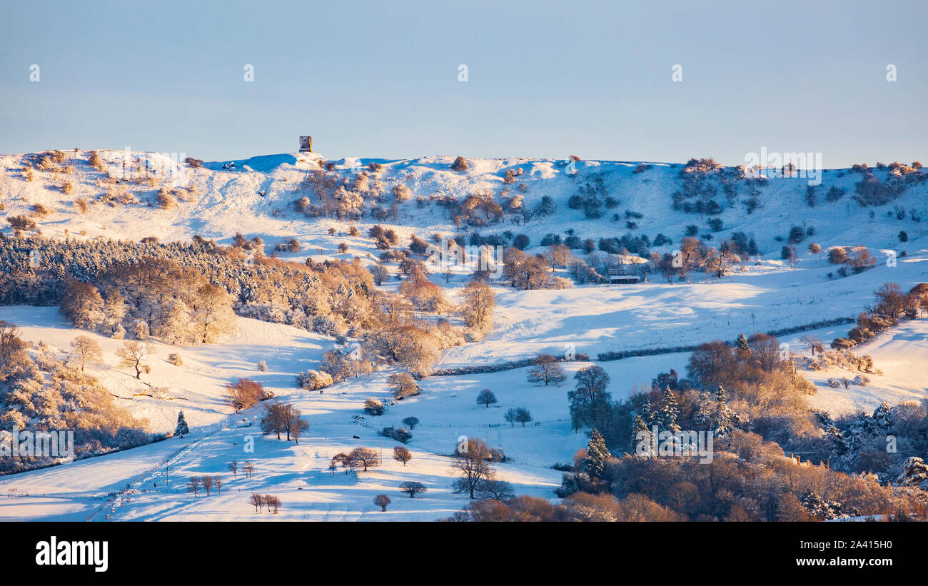 Snow covered Bredon hill in the Cotswolds AONB, Worcestershire, England ...