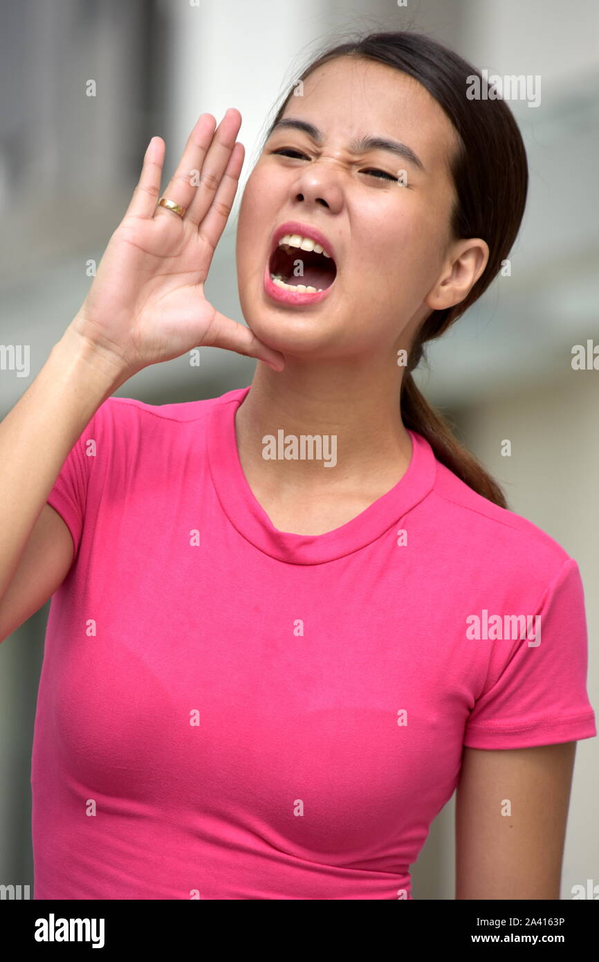 Youthful Woman Yelling Stock Photo - Alamy Youthful Woman Yelling Stock Photo - Alamy