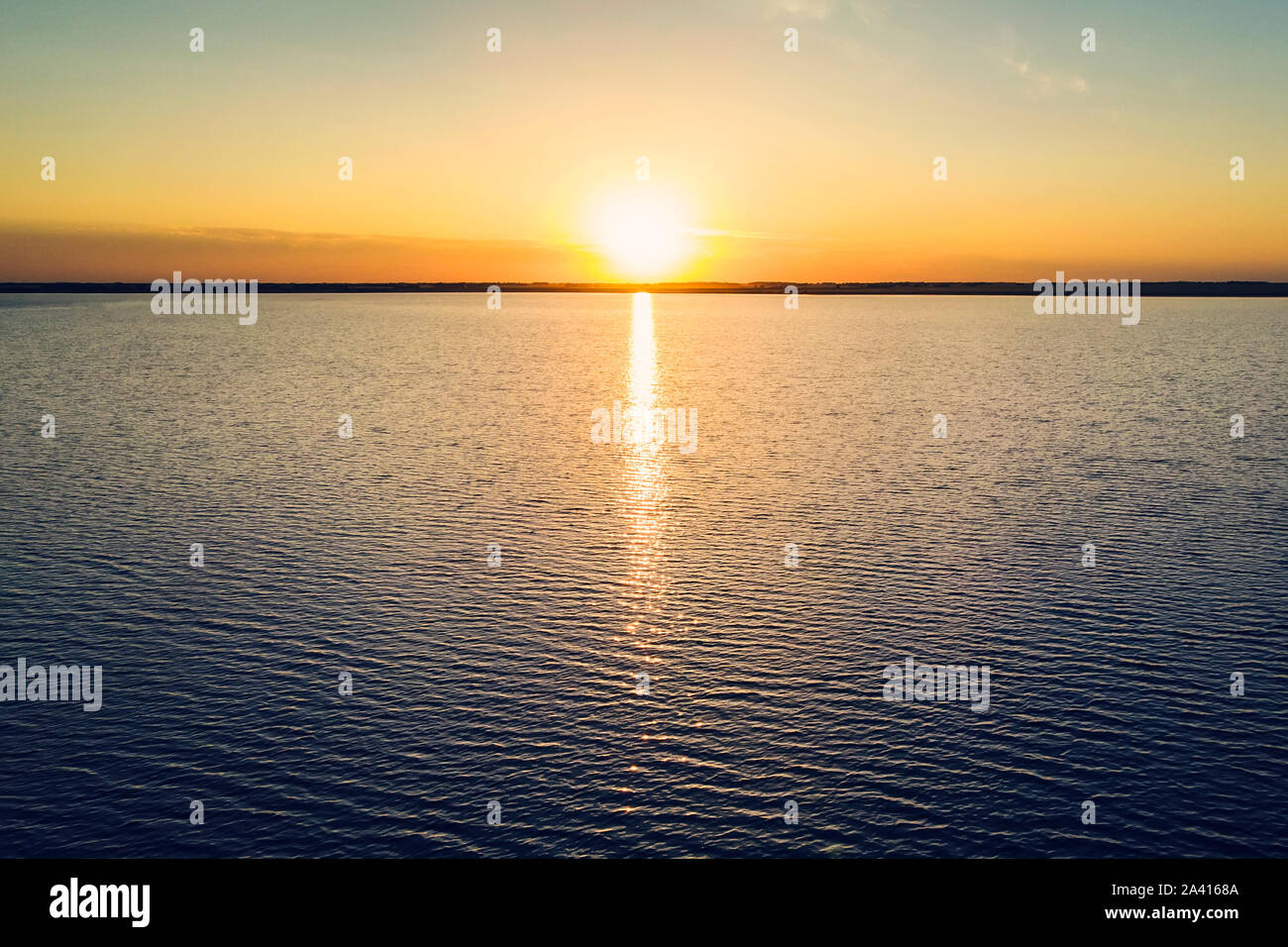 Dramatic golden beach sunset sky and tropical sea background. yellow ...