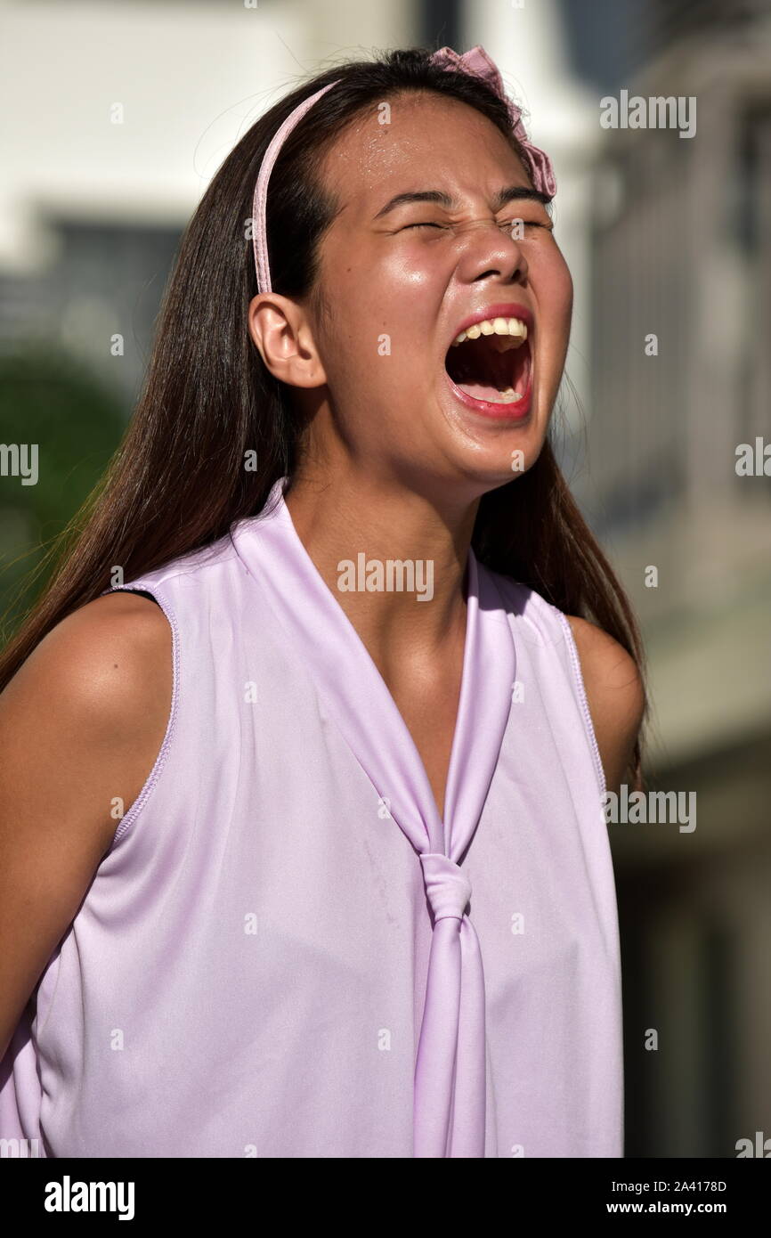Youthful Filipina Female Shouting Stock Photo - Alamy