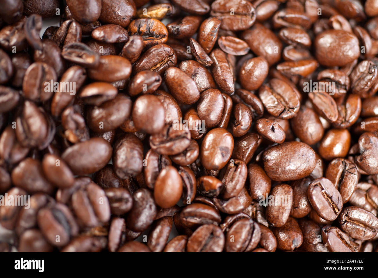 Fresh coffee beans before being ground Stock Photo - Alamy