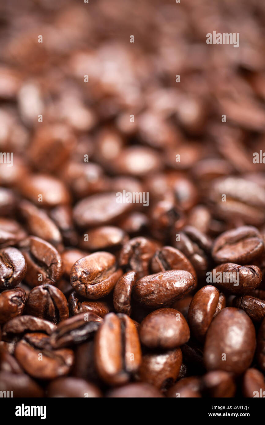 Fresh coffee beans before being ground Stock Photo - Alamy