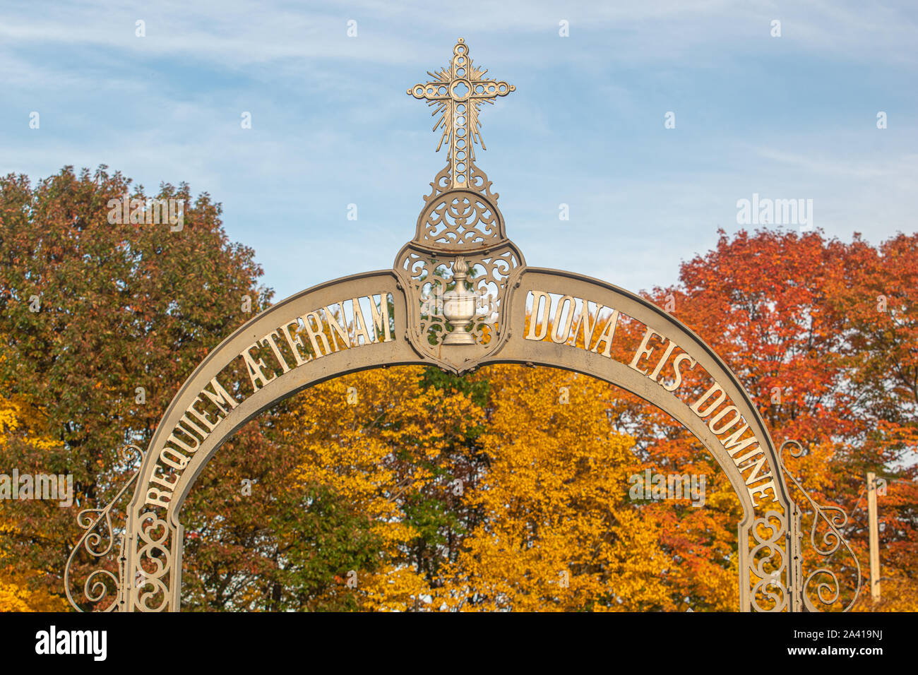 arch marking the entrance of catholic cemetary Stock Photo - Alamy