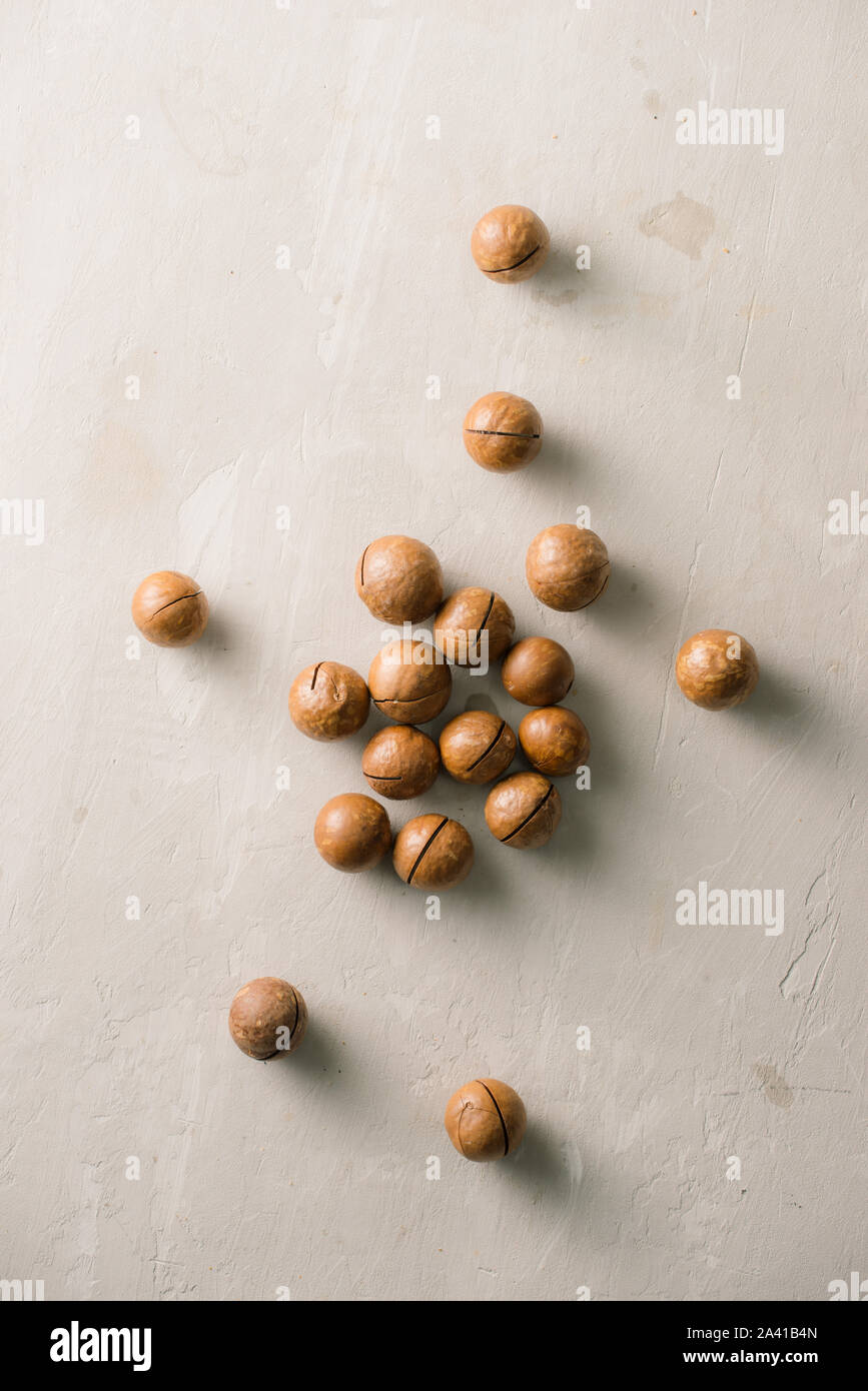 Superfood. Organic macadamia nut on stone background Stock Photo - Alamy