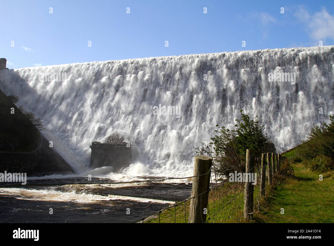 Caban Coch dam in the Elan Valley in full flow after the heavy rainfall ...