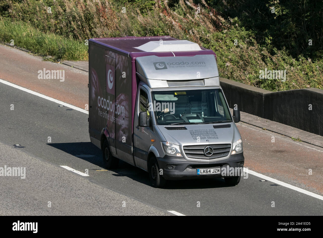 Mercedes Sprinter Ocado grocery delivery vehicle travelling northbound ...