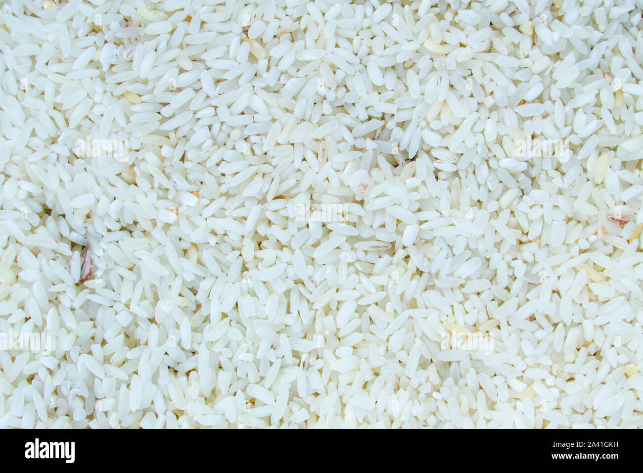 White rice grains background pattern hi-res stock photography and ...