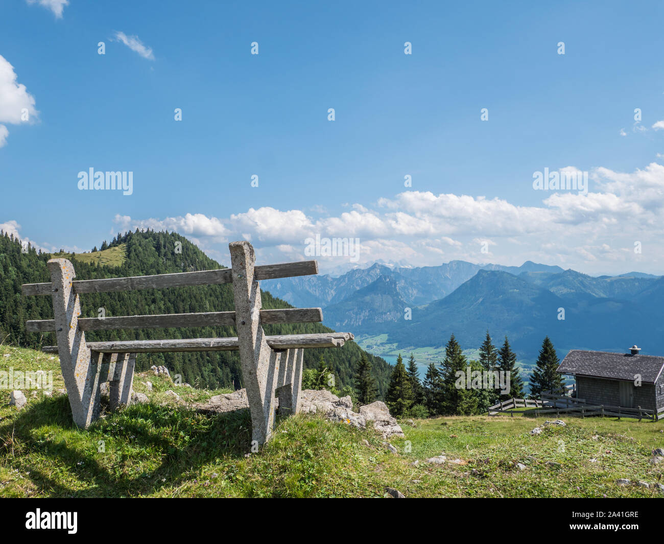 Bench on a mountain peak in the Alps Stock Photo - Alamy