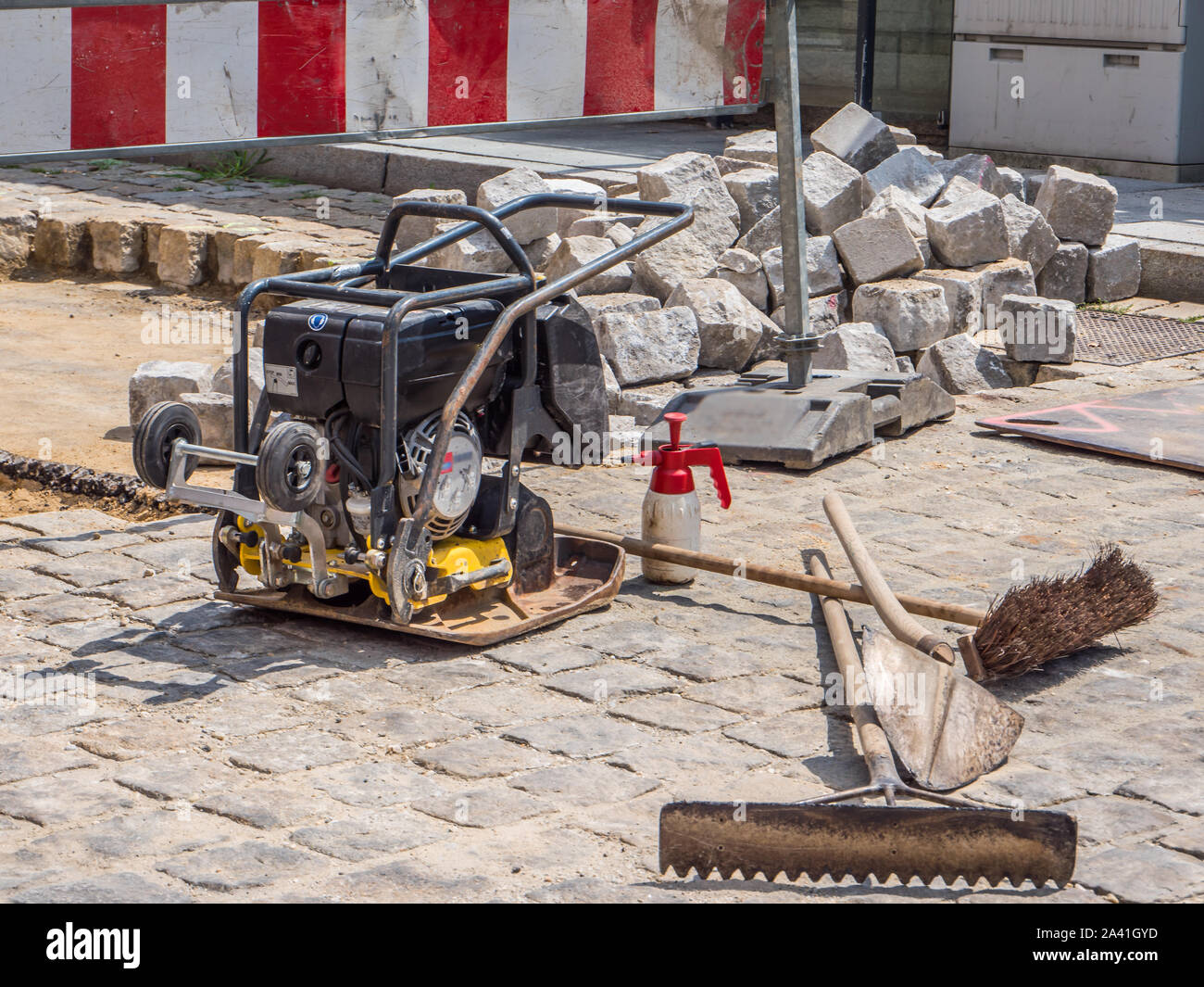 Road construction vibrating plate construction site Stock Photo - Alamy