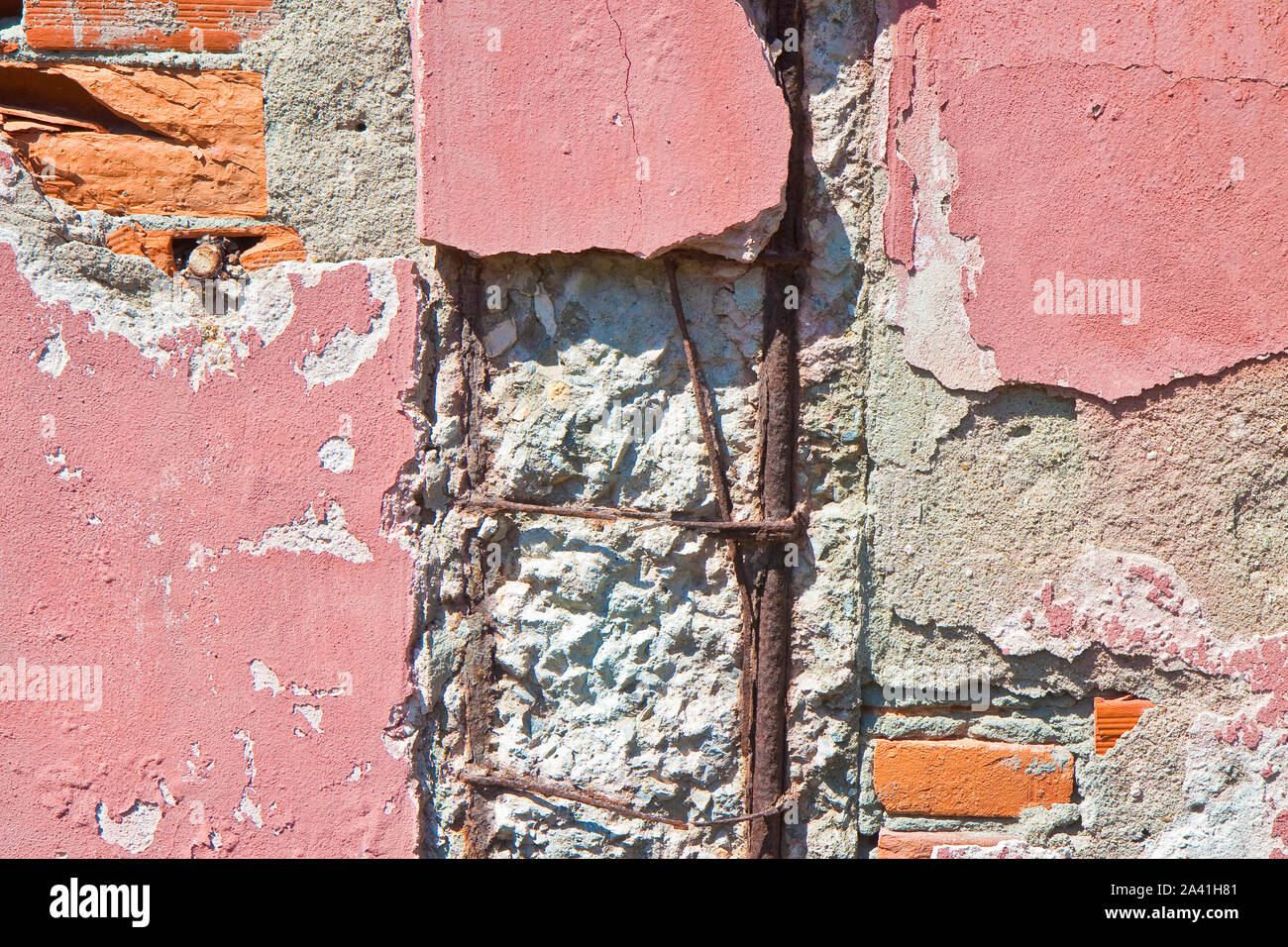 Old reinforced concrete structure with damaged and rusty metallic ...