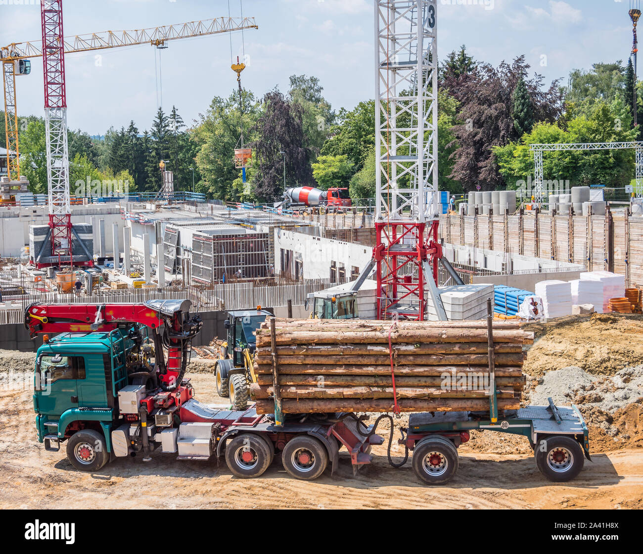 Large construction site with wooden truck Stock Photo - Alamy