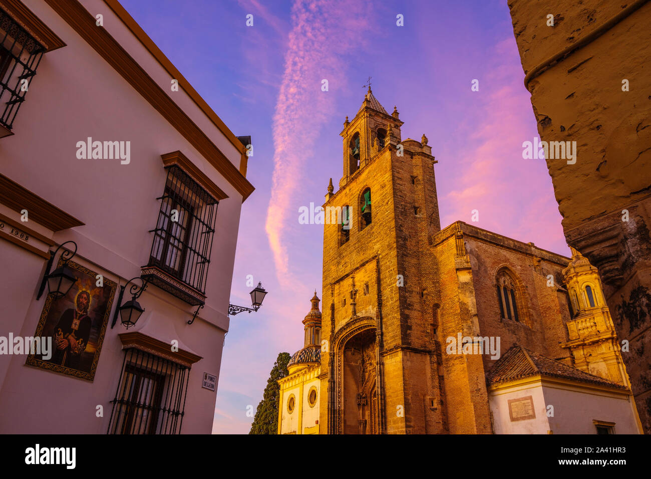 Gothic style Church of Santiago at dusk in Utrera, Sevilla province ...