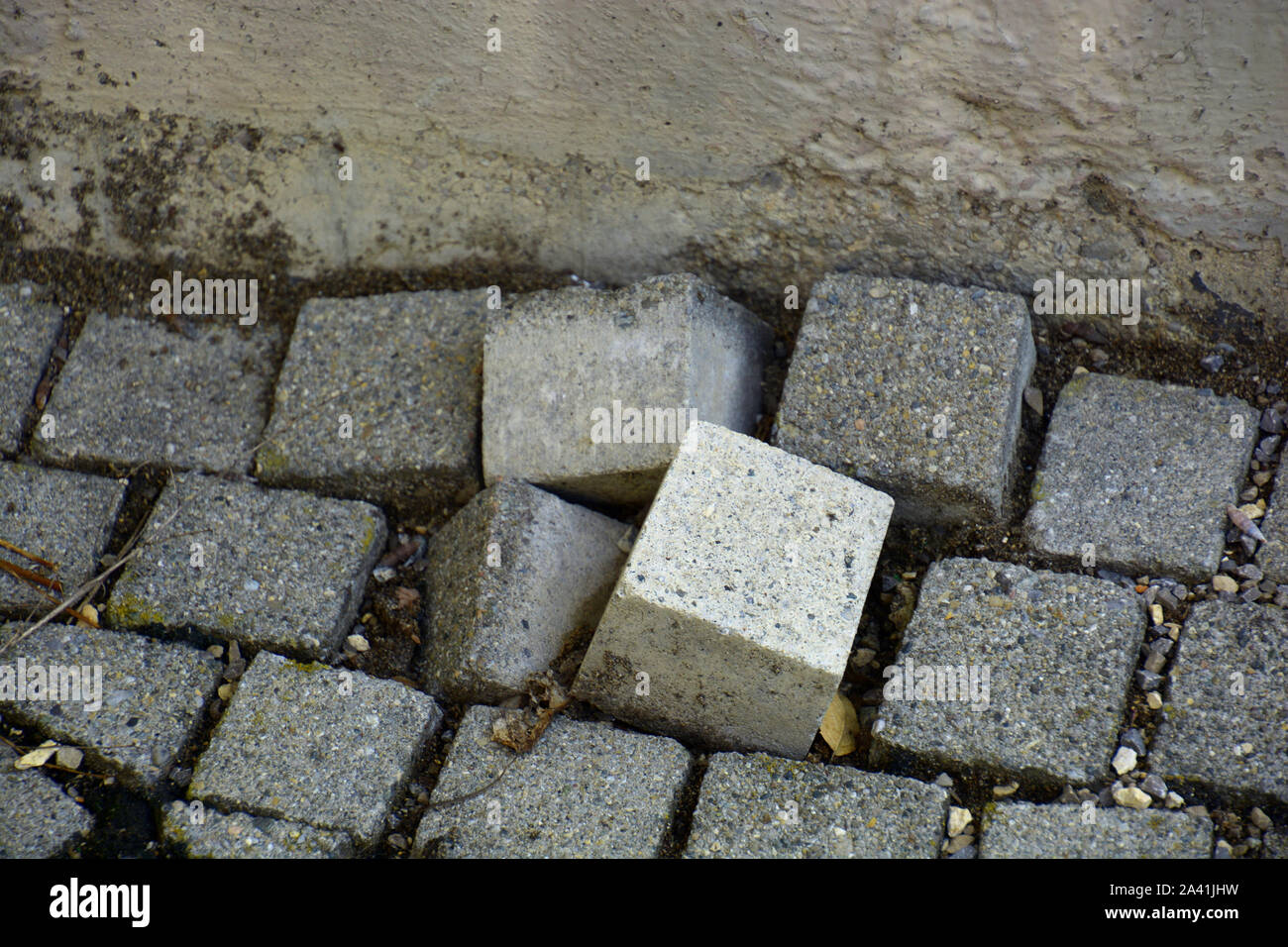 uneven cobble stones in vintage paving, bumpy paving stone surface of ...