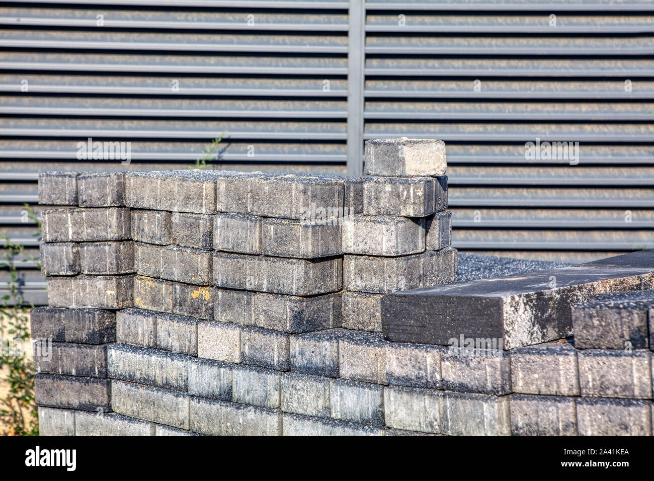 grey bricks arranged for construction work Stock Photo - Alamy