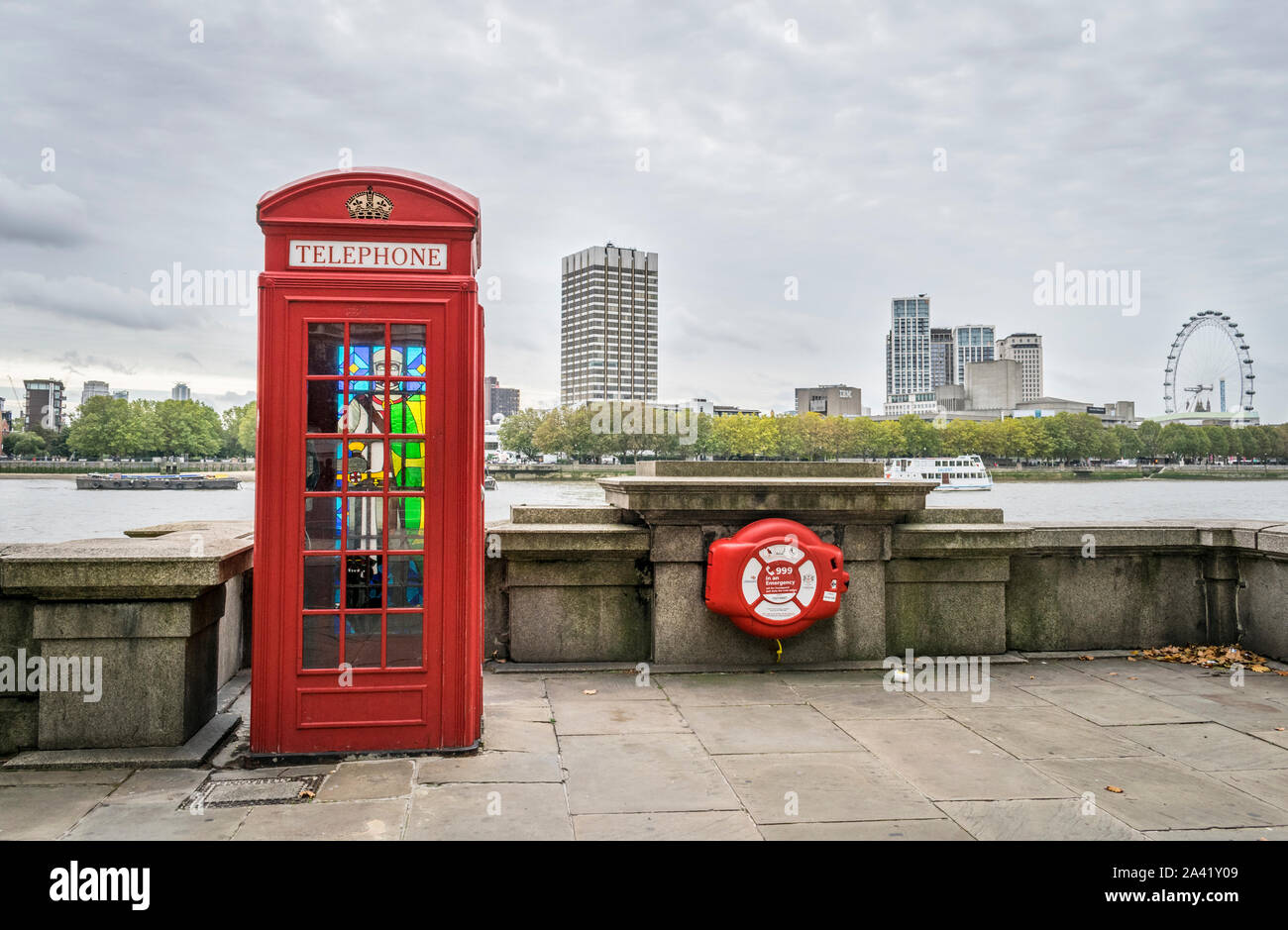 Old style London Telephone box with stained glass on the back panel ...