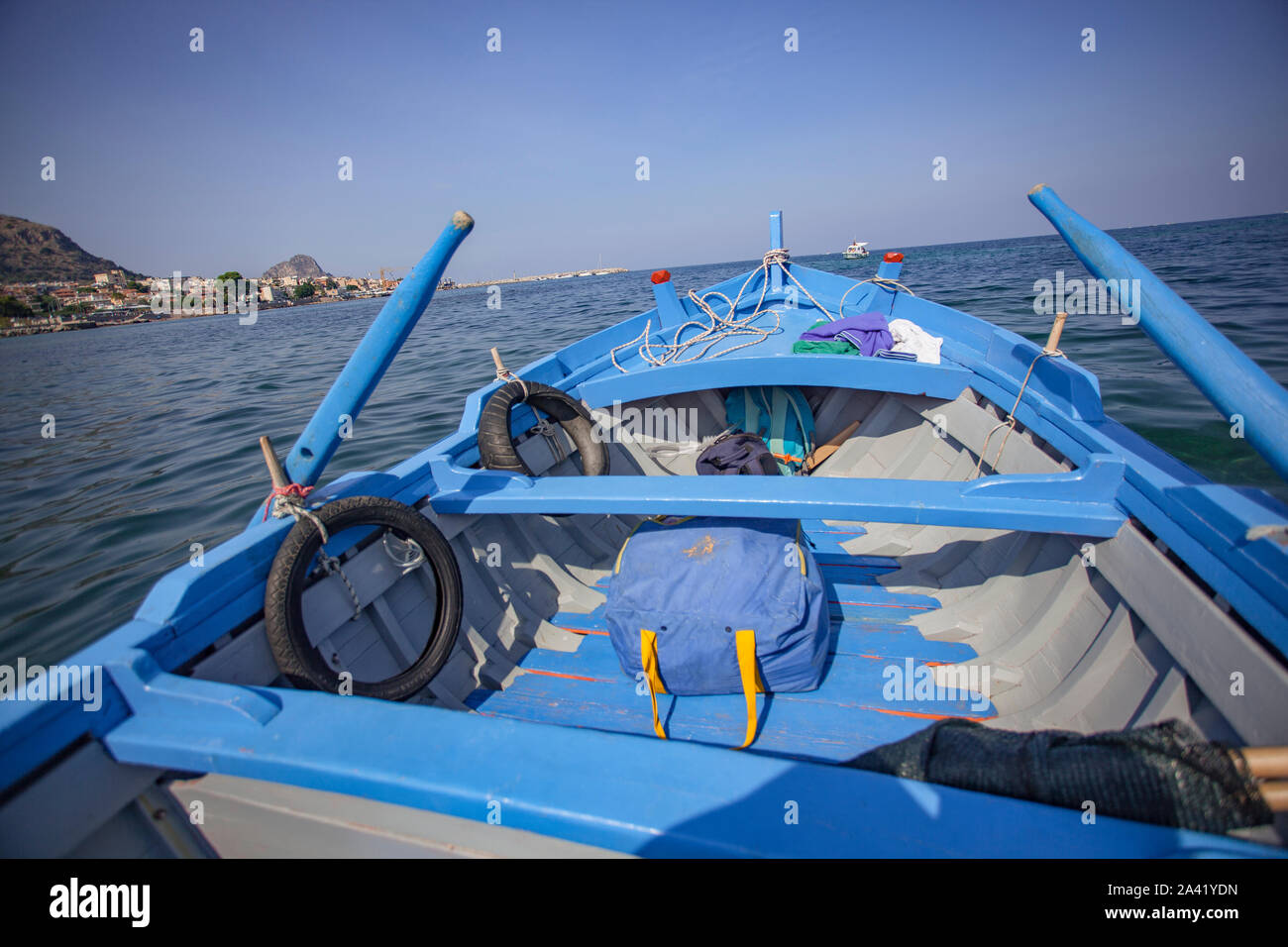 Blue Rowboat in sea 3 Stock Photo - Alamy