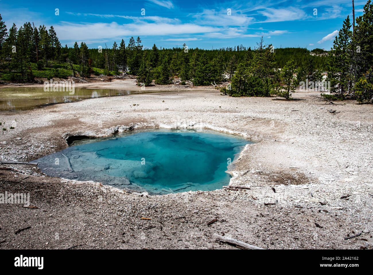 Boiling blue hot spring in Yellowstone Stock Photo - Alamy