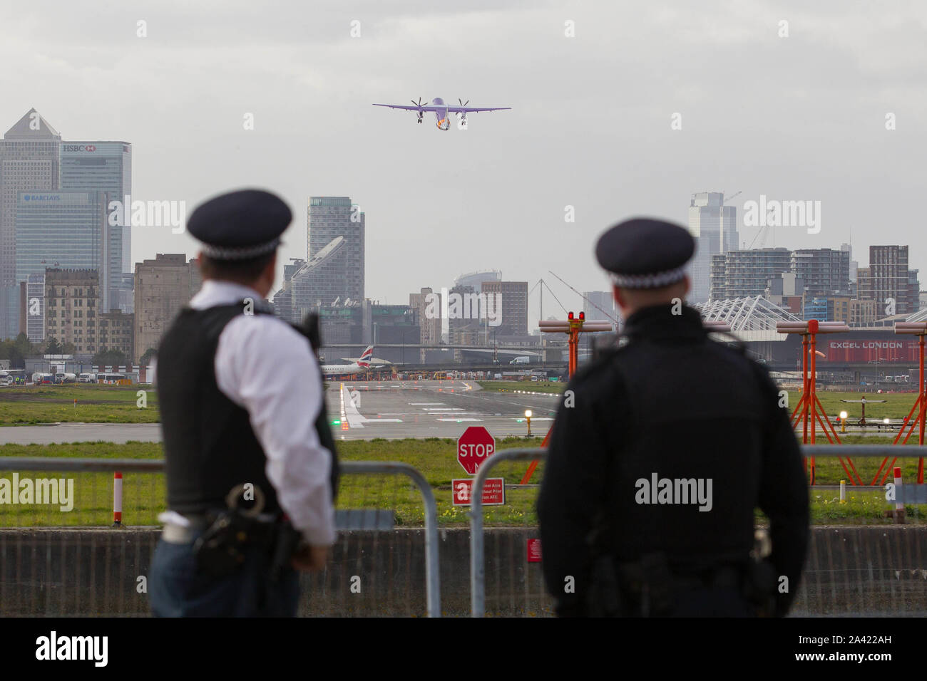 A jet plane takes off from the runway at London City Airport as Police ...
