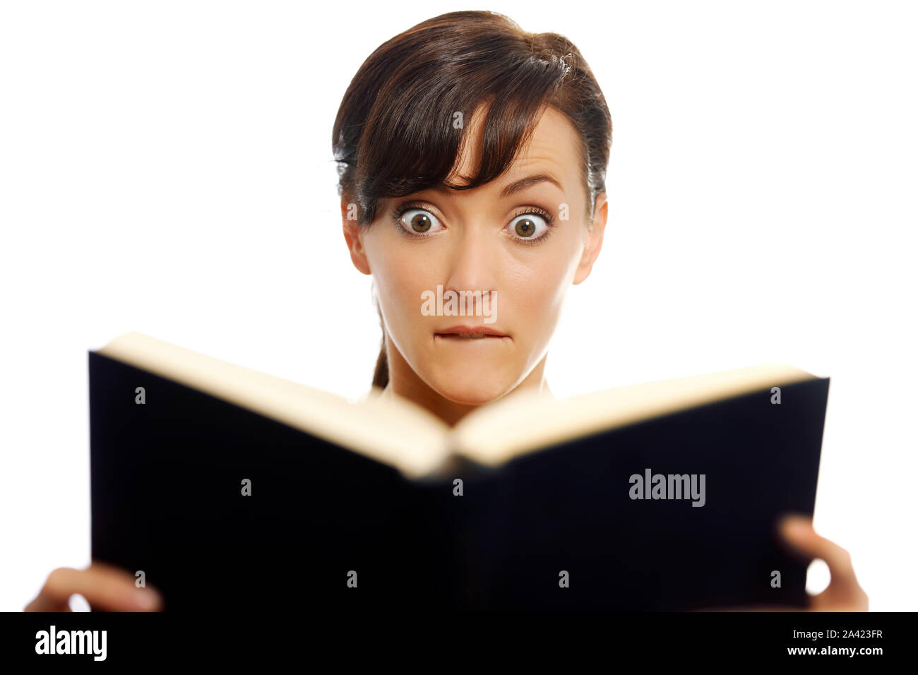 Reading a scary book hi-res stock photography and images - Alamy