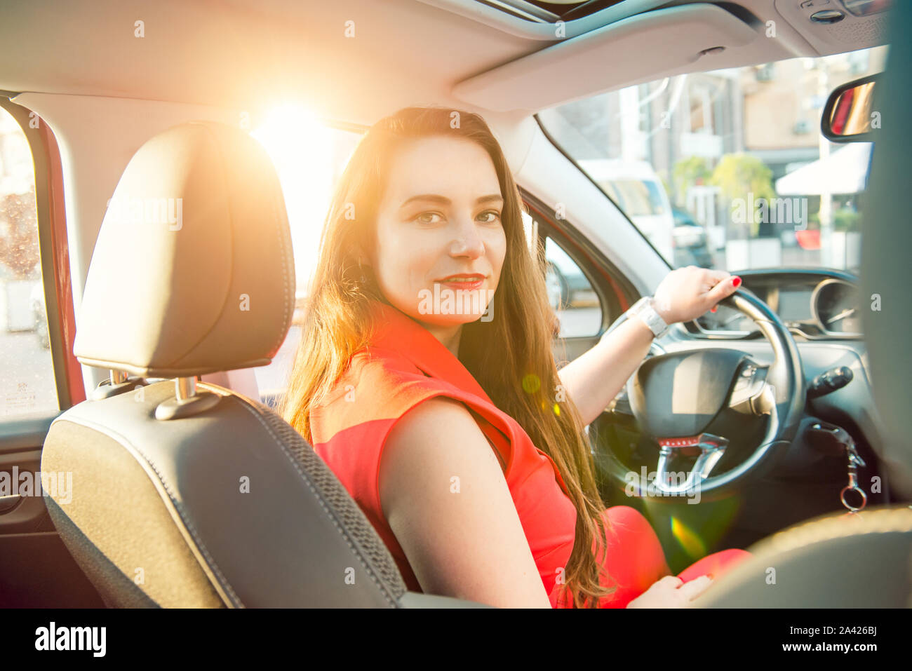 Back view Portrait of business lady, caucasian young woman driver ...