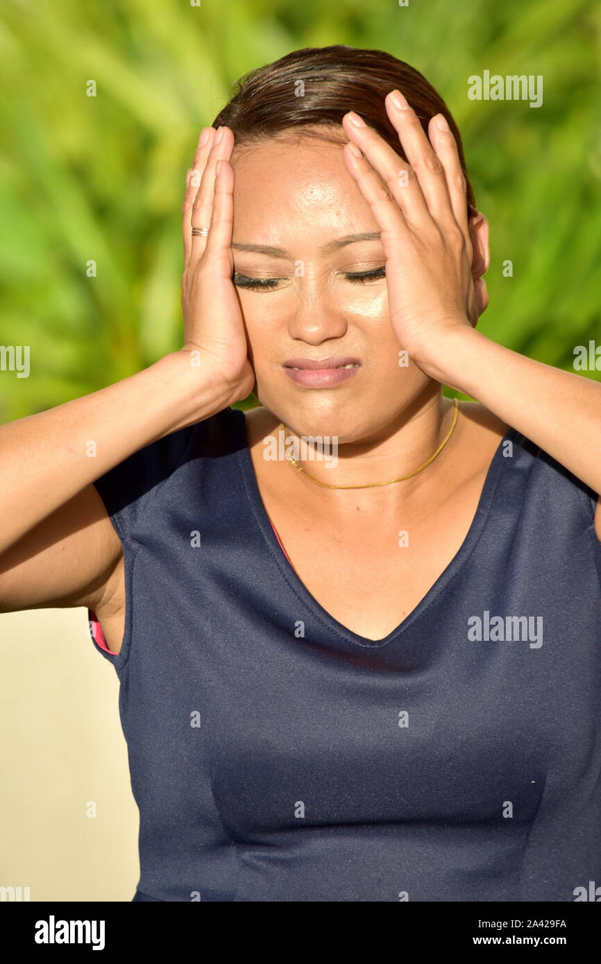Youthful Asian Female Under Stress Stock Photo - Alamy