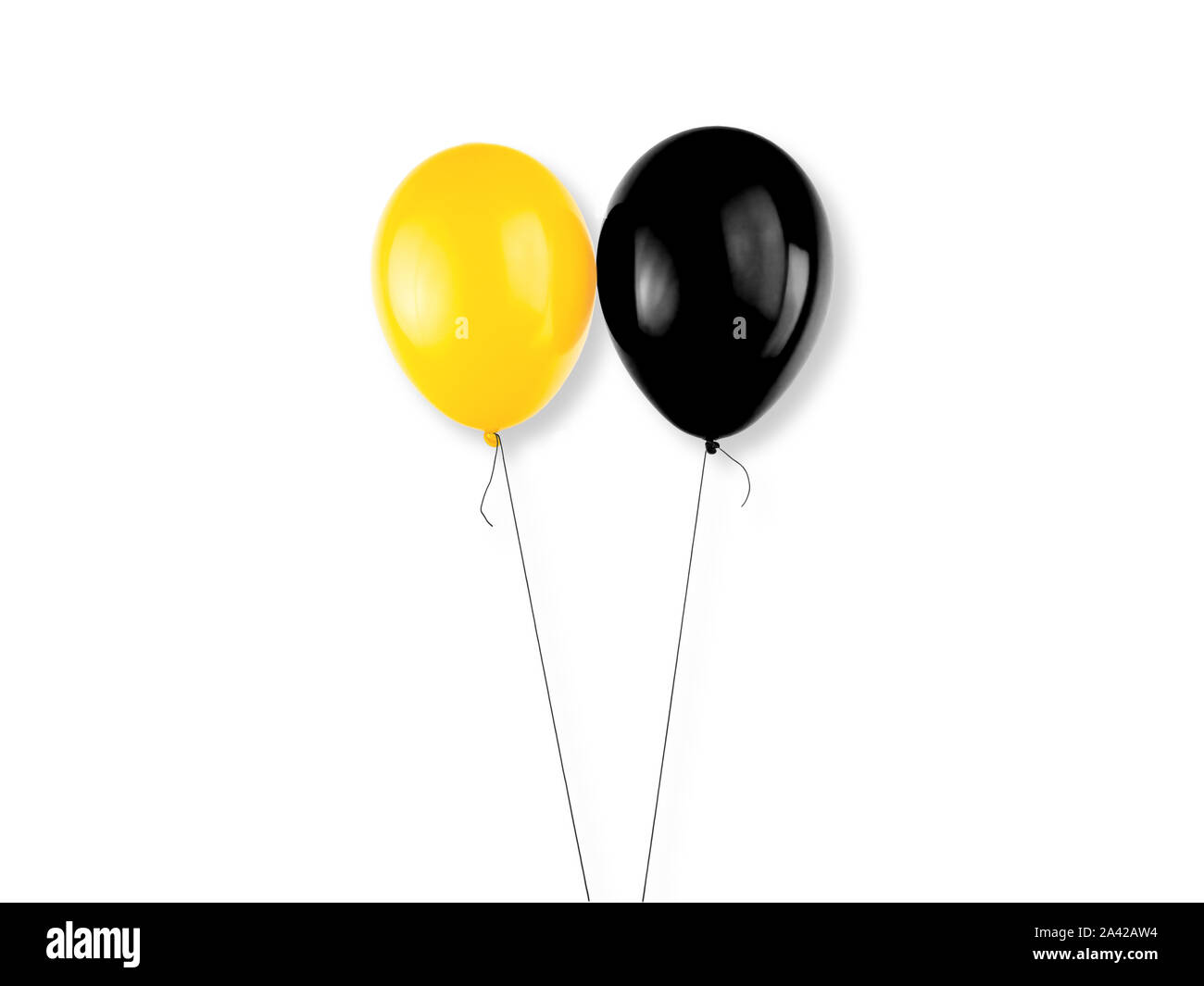 Black and yellow balloons isolated on white background. Flying balloons ...
