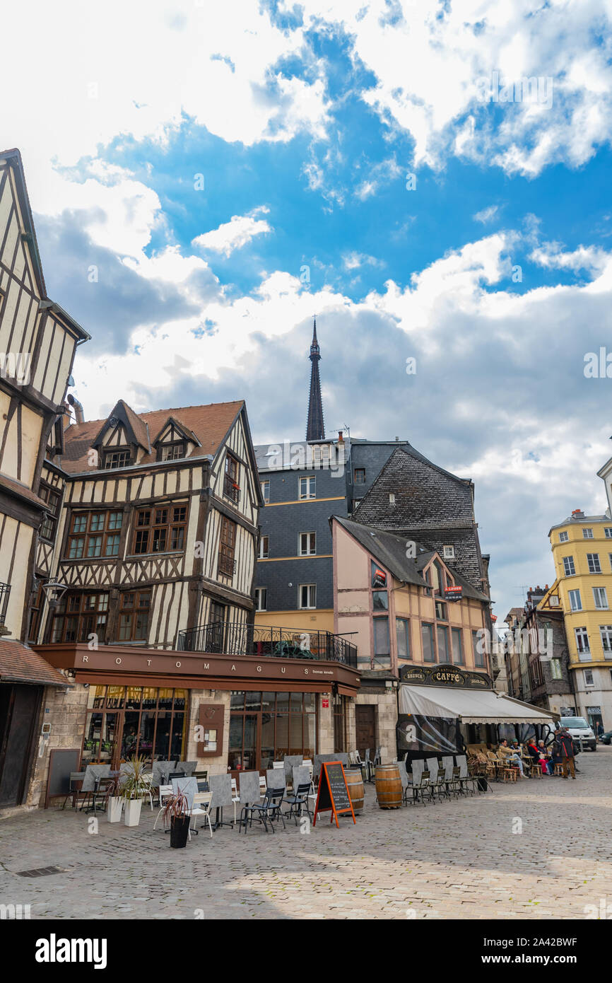 View of downtown square with buildings, cafe and half-timbered houses ...