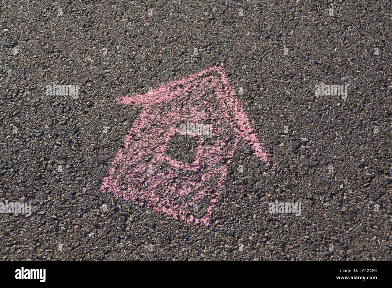 Chalk drawing or text in a asphalt Stock Photo - Alamy
