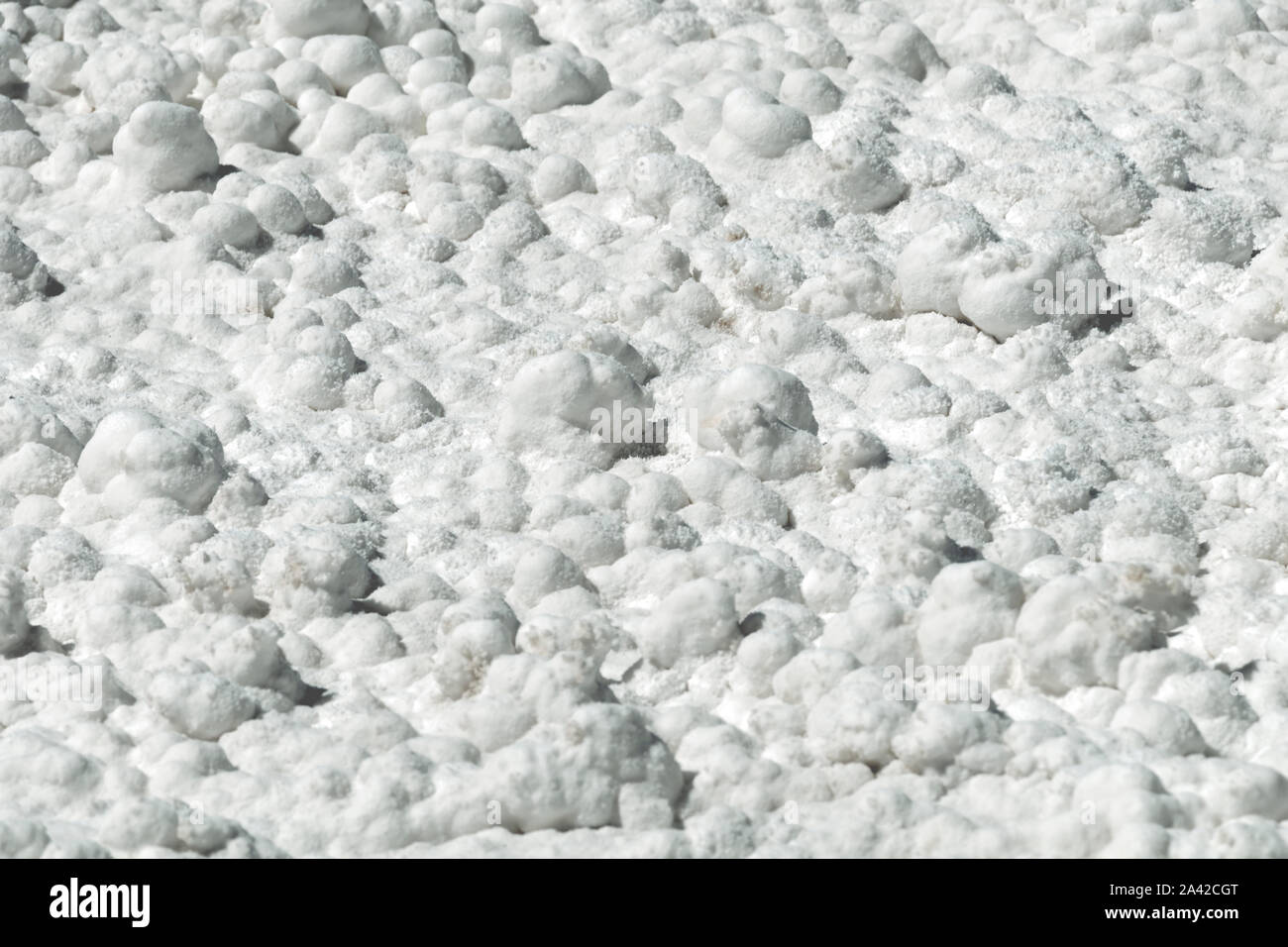 Salt crystals on the salty surface of saline desert close up. Natural ...