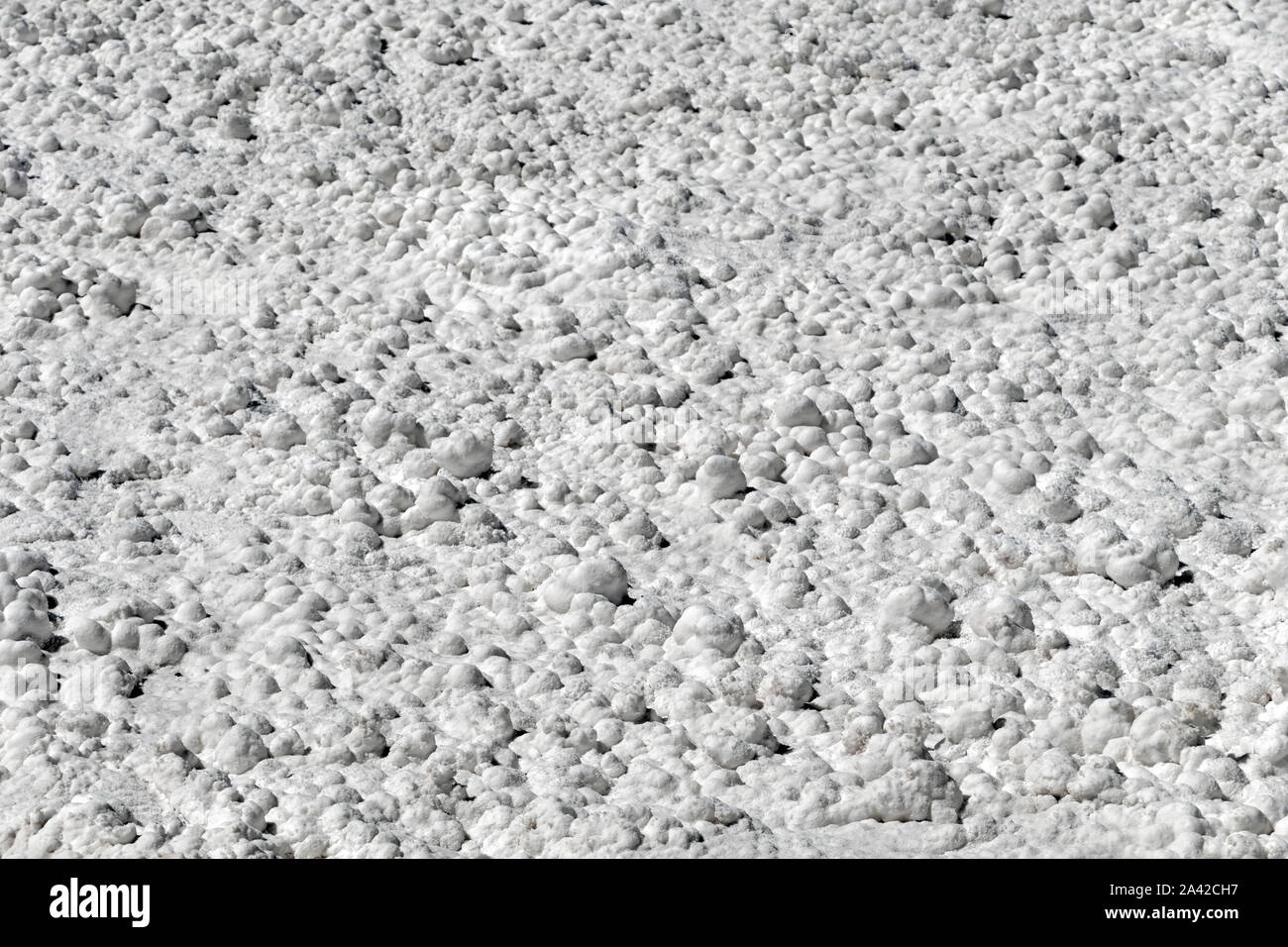 Salt crystals on the salty surface of saline desert close up. Natural ...