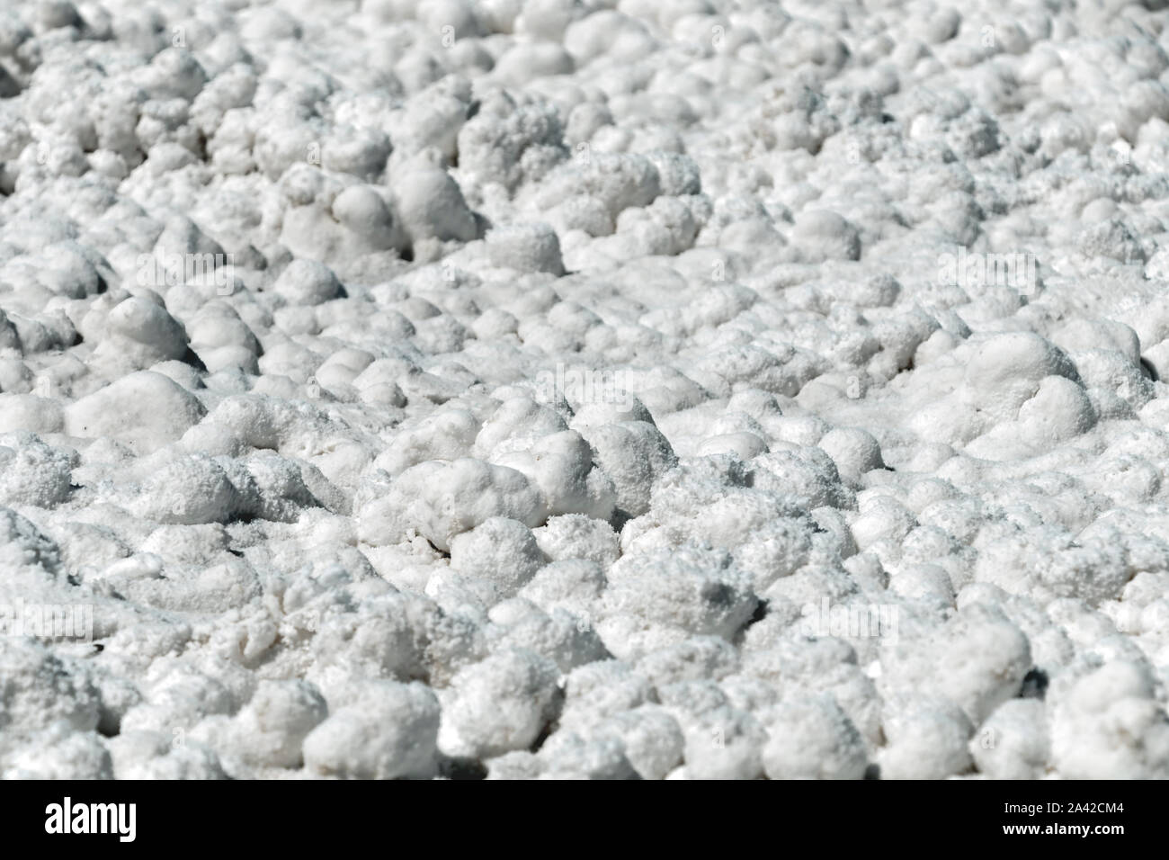 Salt crystals on the salty surface of saline desert close up. Natural ...