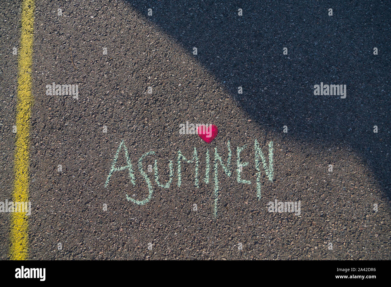 Chalk drawing or text in a asphalt Stock Photo - Alamy