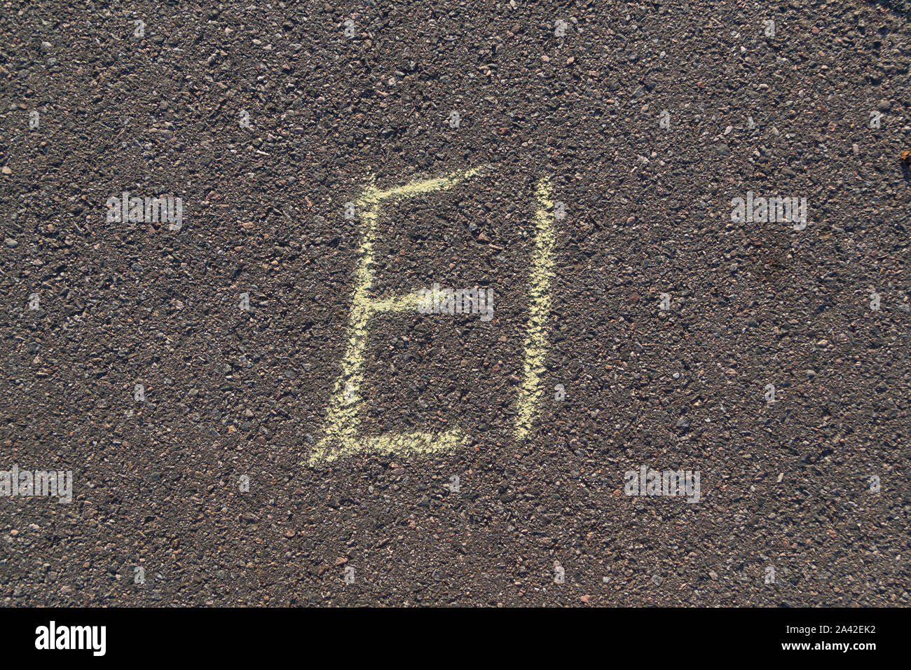 Chalk drawing or text in a asphalt Stock Photo - Alamy